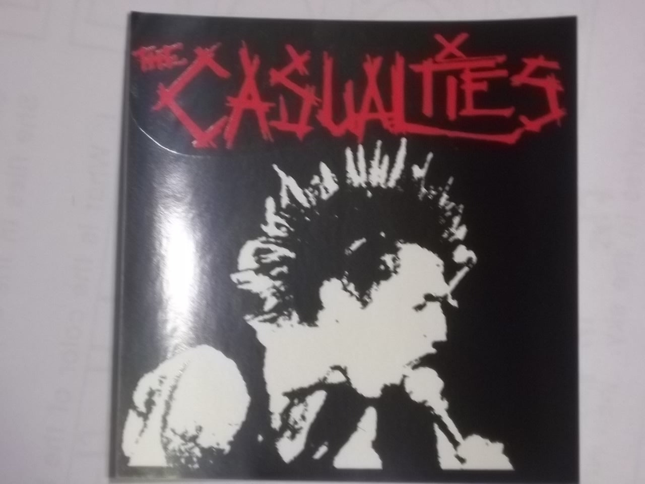 CASUALTIES - SINGER STICKER – Headline Records